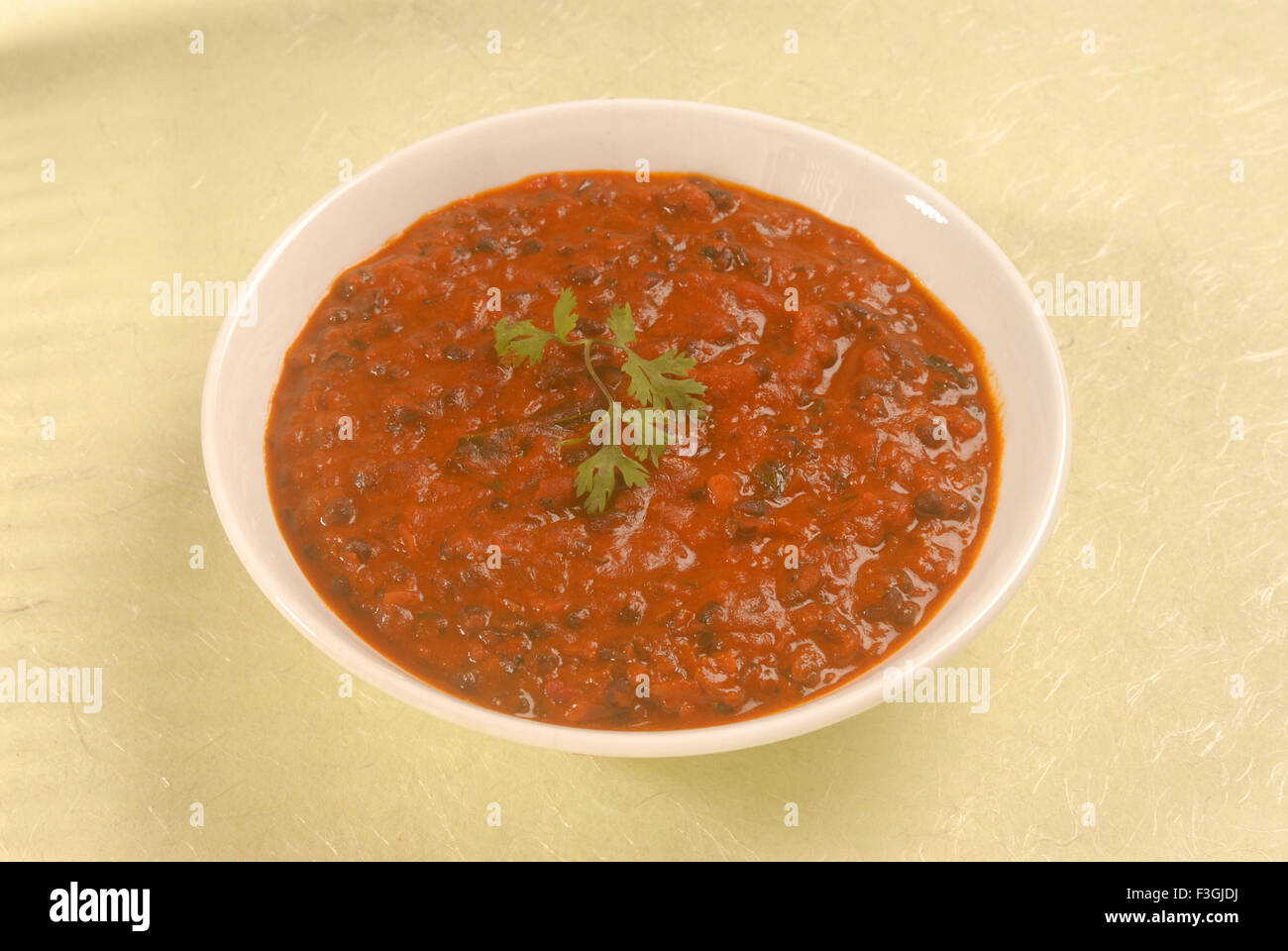 Vegetarian ; Indian food Kali Dal made from black peas in plate Stock ...