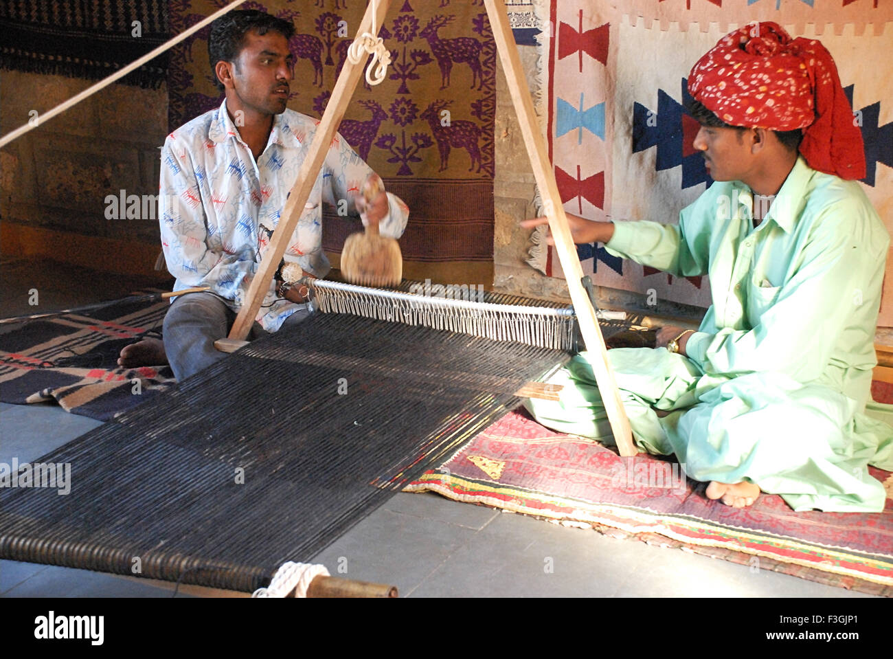 rural worker weaving making woolen woollen cloth handloom Kutch Gujarat ...