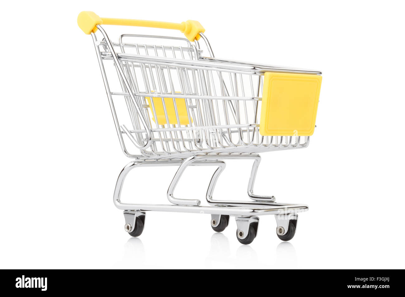 Yellow shopping cart on white Stock Photo - Alamy