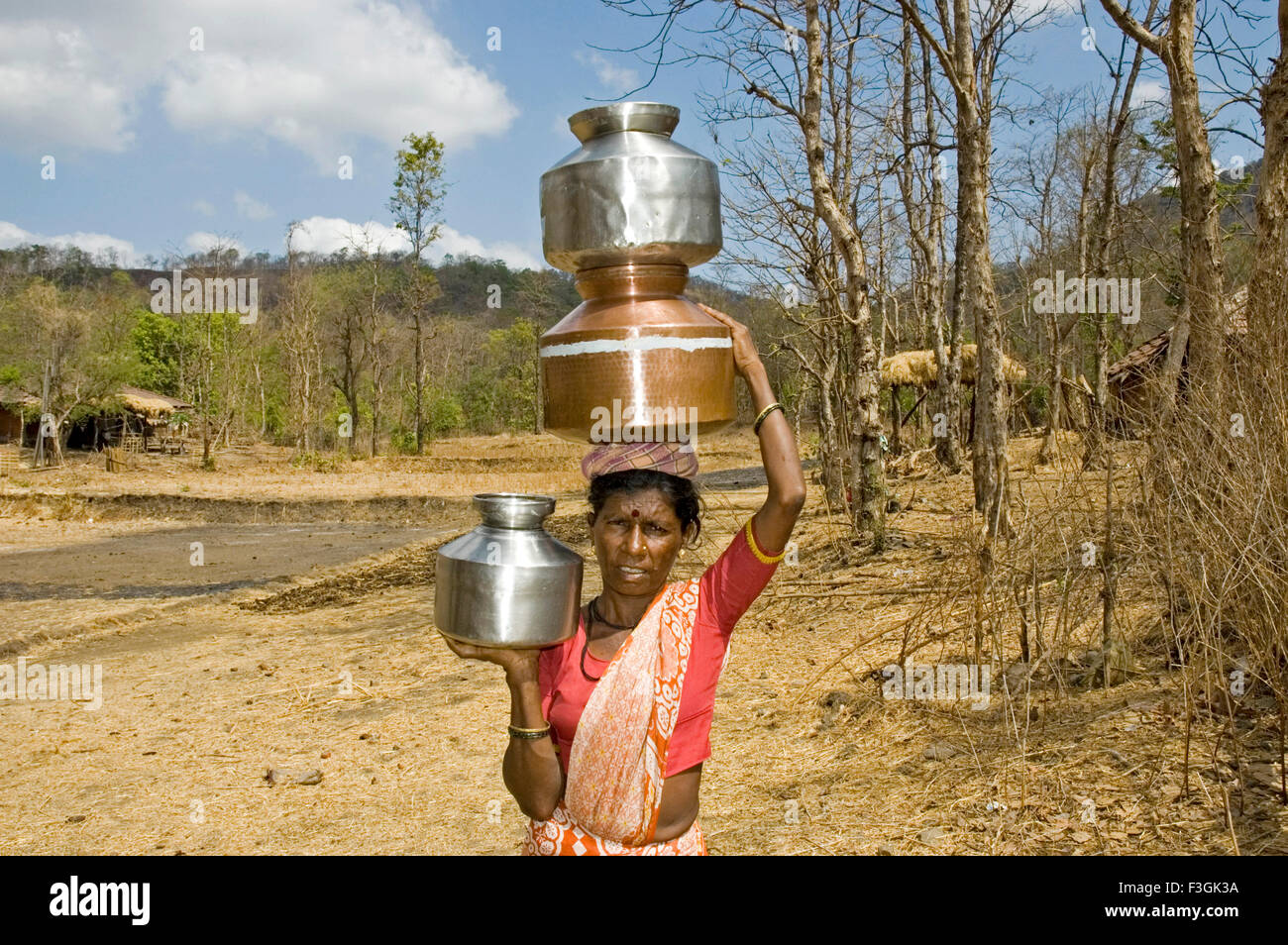 Woman water fetch hi-res stock photography and images - Alamy