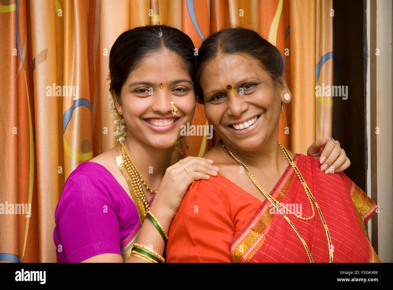 Indian Hindu girl with mother MR#515 Stock Photo - Alamy