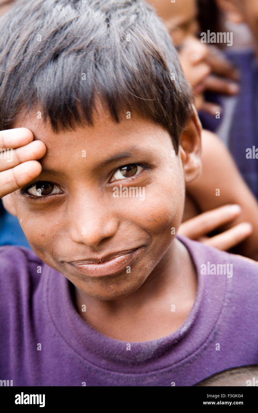 South Asian Indian Poor boy salaam smiling ; village Manik gunj ...