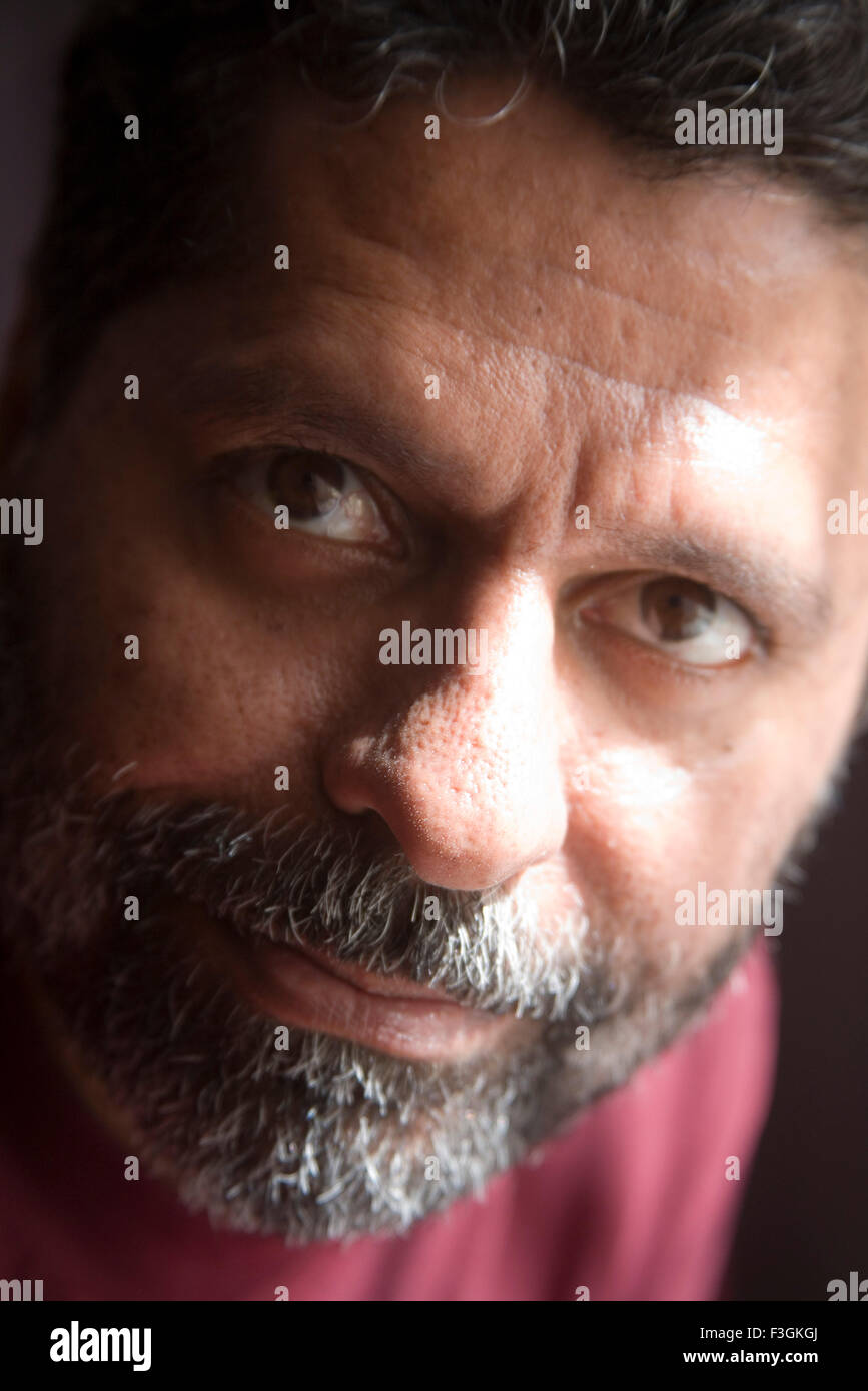 South Asian Indian man Ravi Shekhar looking at camera ; Bombay Mumbai ...
