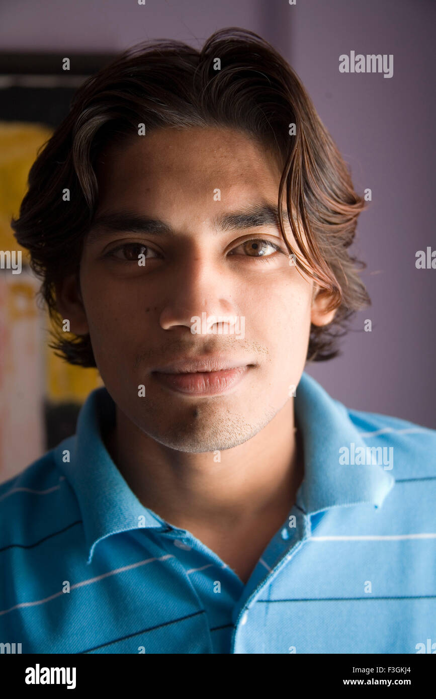 Kaushik twenty one years old Southeast Asian boy looking at camera ...