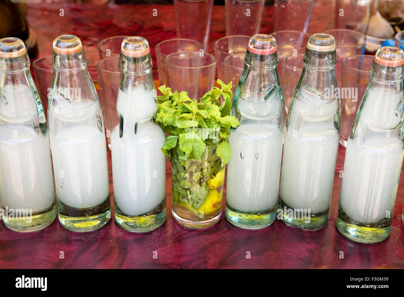 Lemon Soda in glass reusable bottles with a marble stopper ...