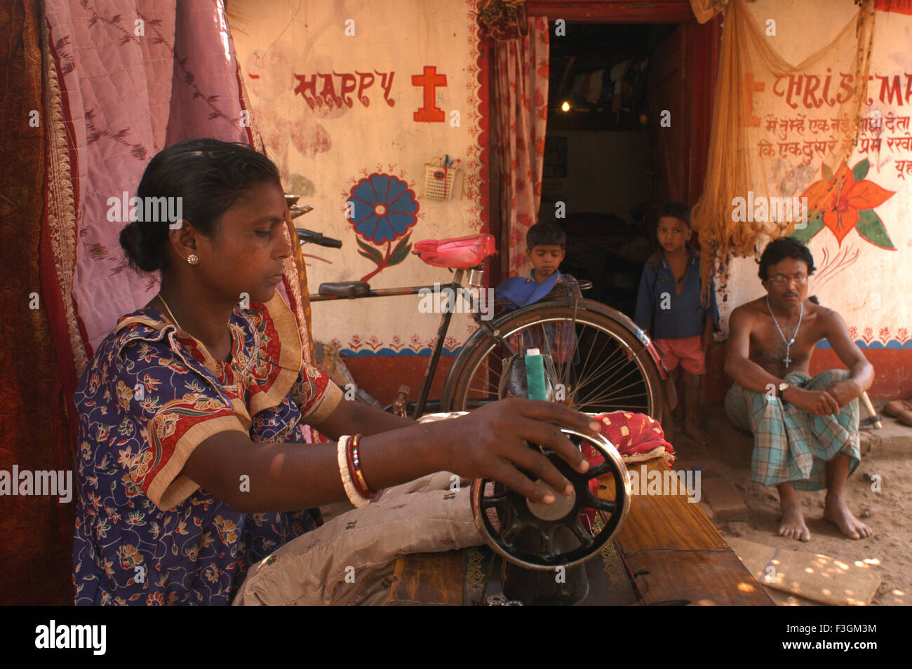 Self sufficient women working on sewing machine Stock Photo - Alamy