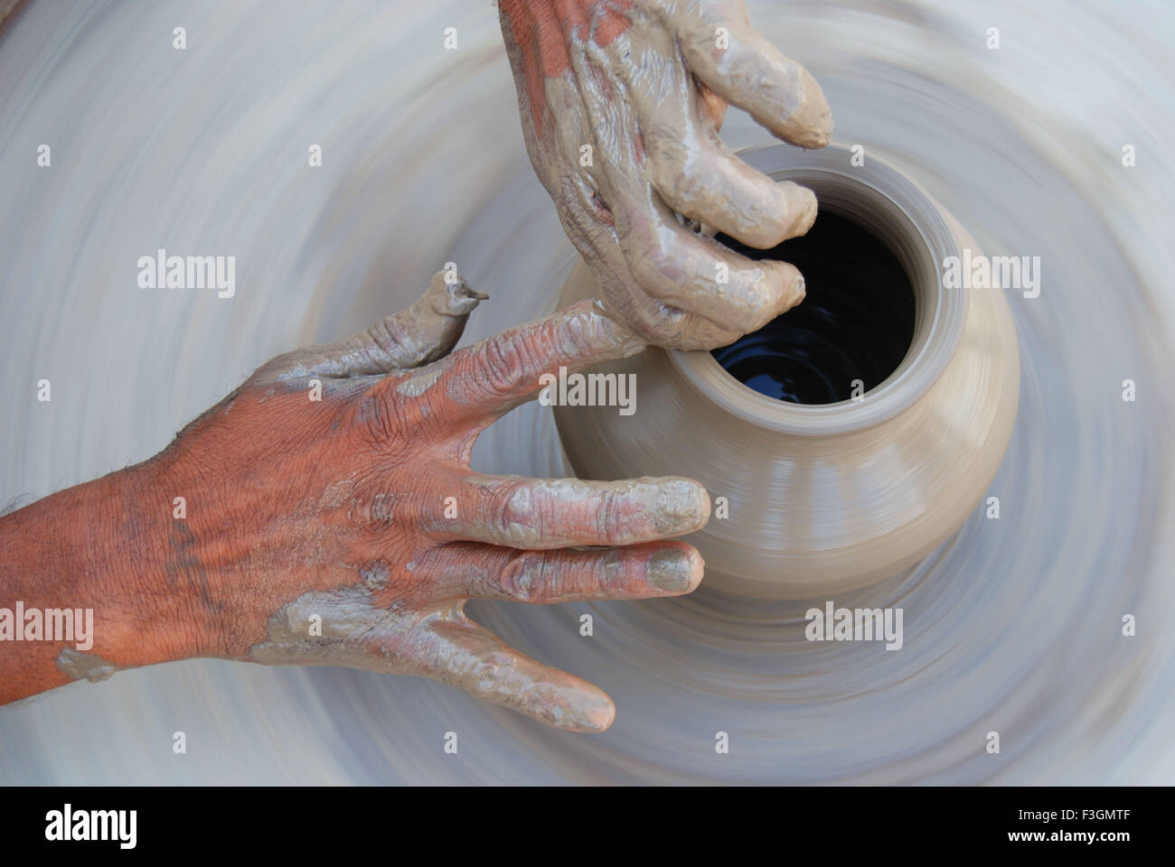 Potter making pot on wheel ; Jodhpur ; Rajasthan ; India Stock Photo ...