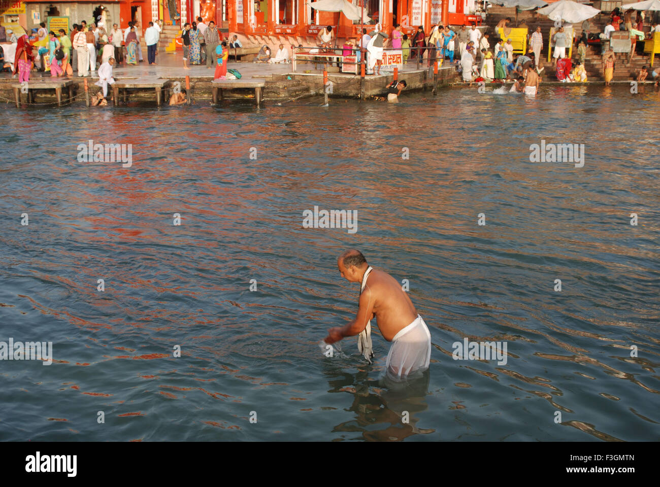 Holy dip in the Ganga river ; Har Ki Pauri ; Haridwar ; Uttar Pradesh ...