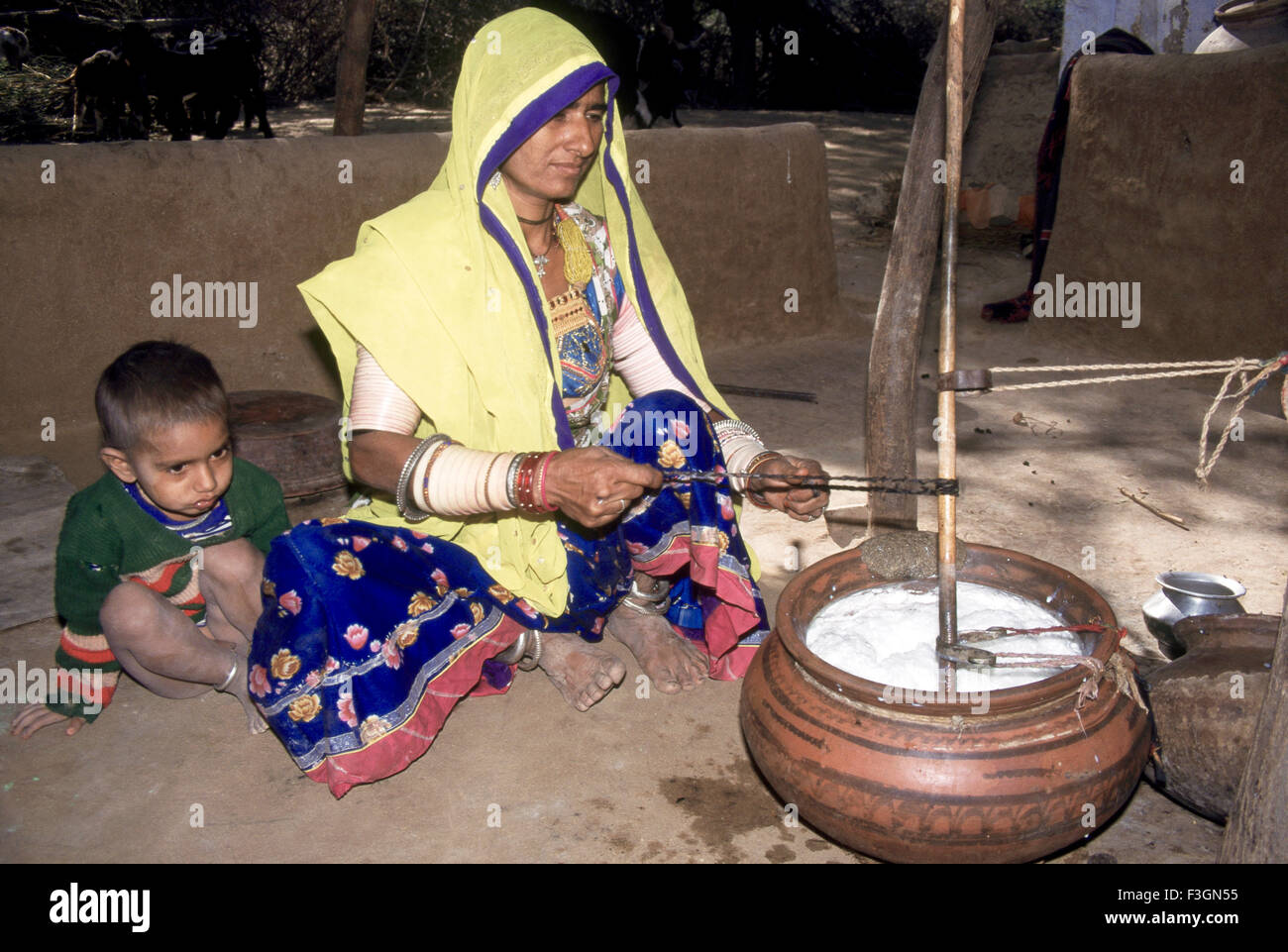 Woman churning buttermilk hi-res stock photography and images - Alamy