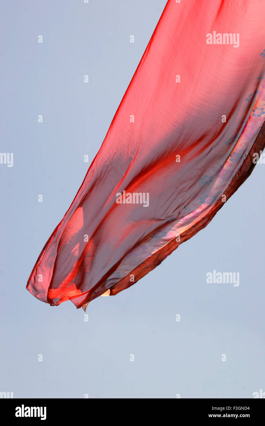 Abstract Indian traditional ladies wear saree red color flying air ...