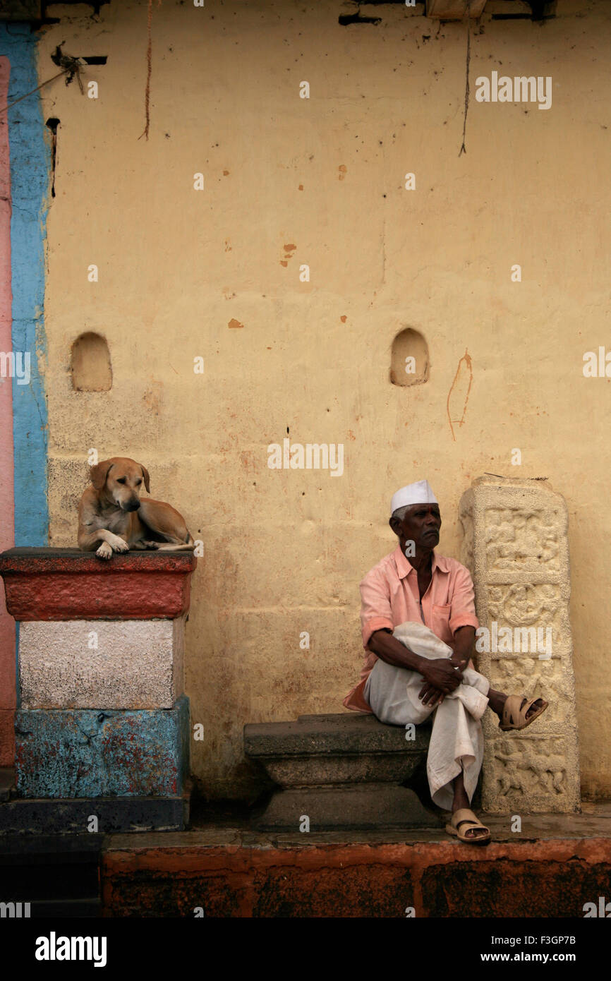 Indian rural man and dog sitting, India, Asia Stock Photo - Alamy