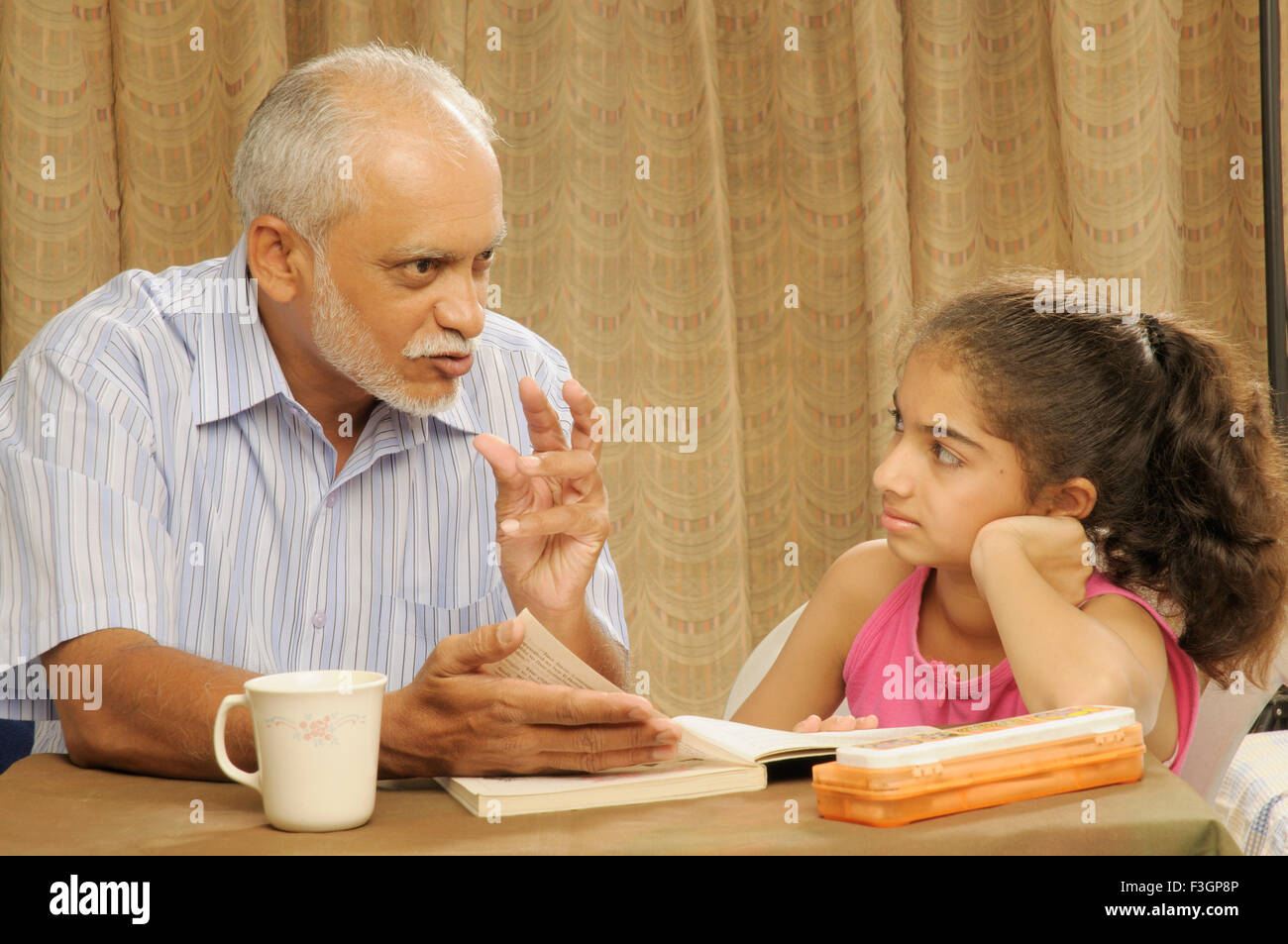 Old man teaching an eleven year old girl ; MR#686O ; 191 Stock Photo ...