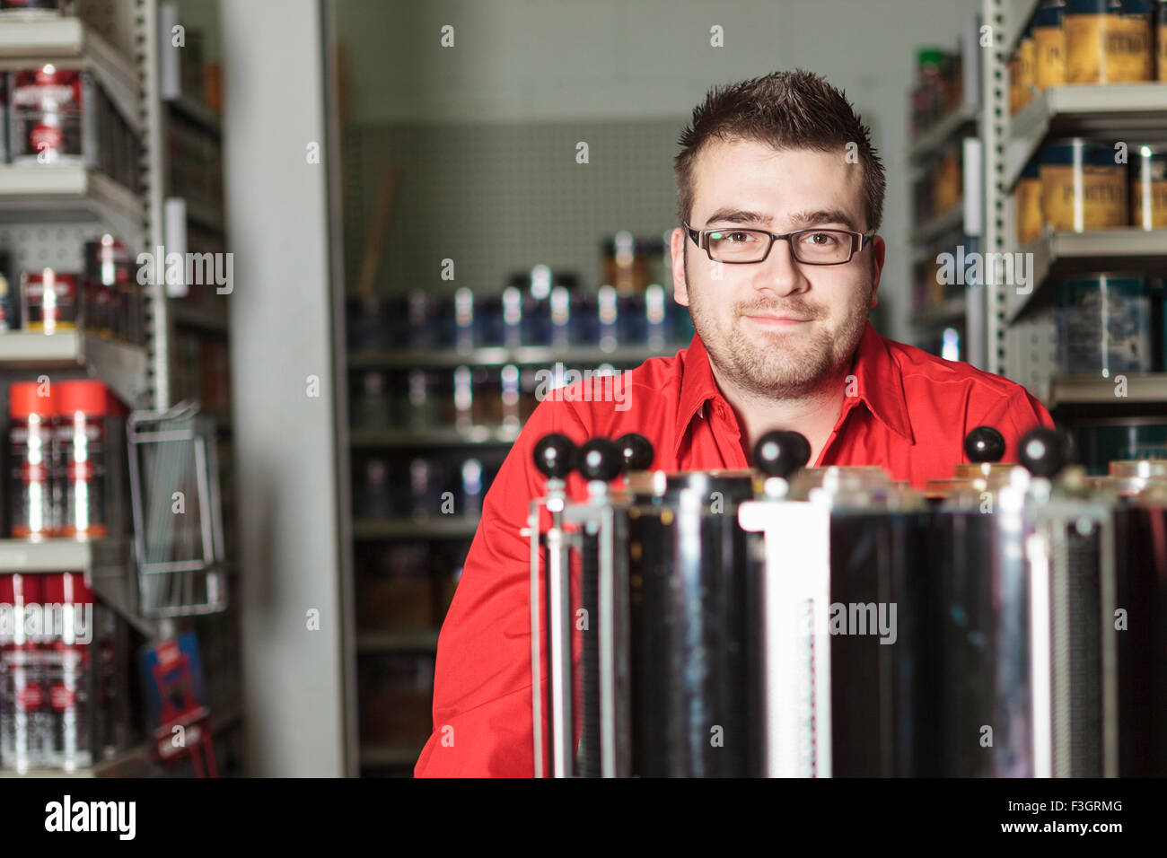 Hardware store employee Stock Photo - Alamy