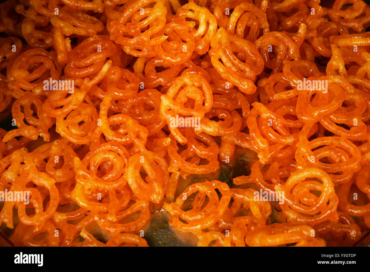 Indian sweet mithai called Jalebis in coiled form ready to served ...