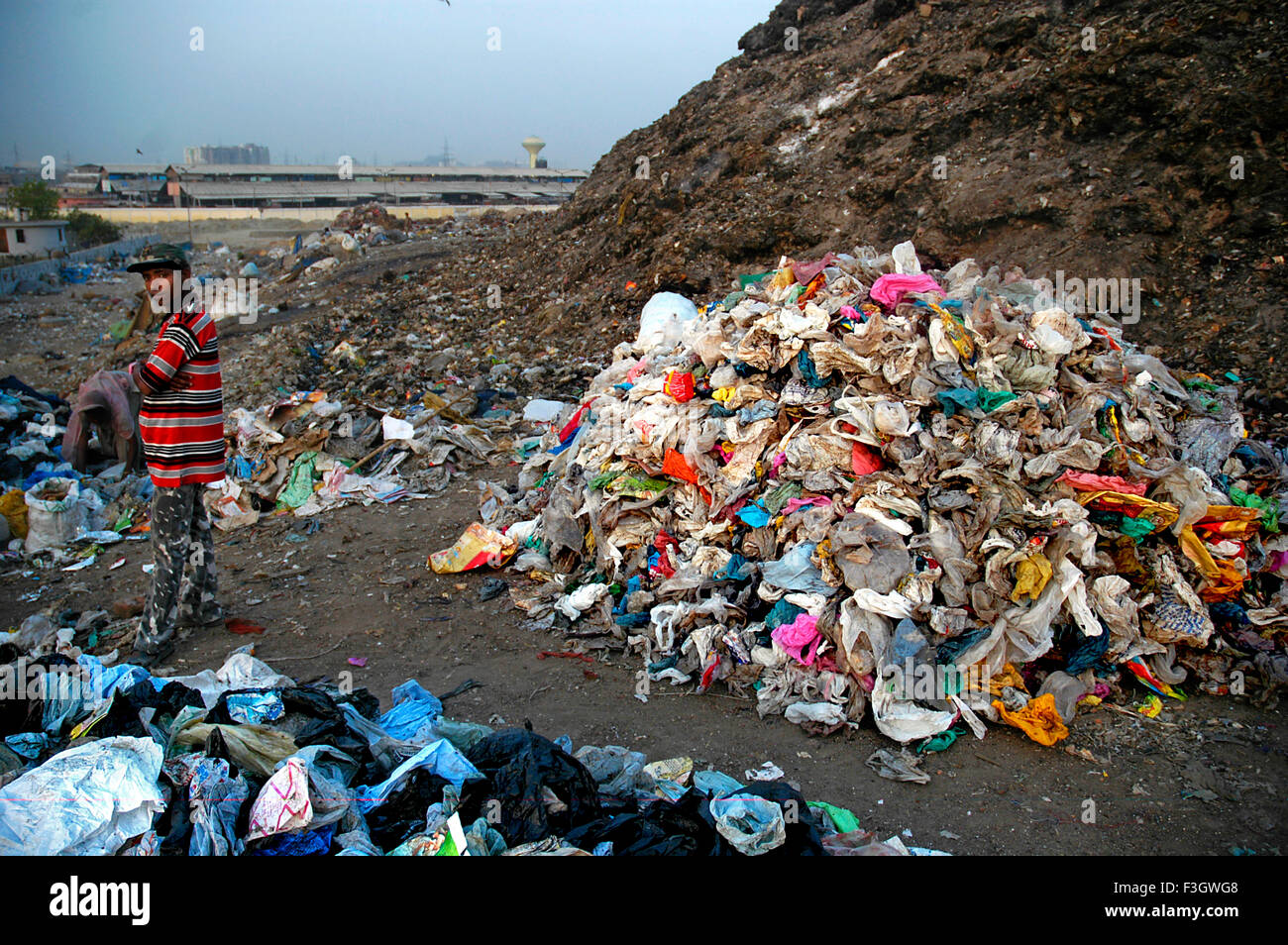 Garbage collector with plastic scrap at Gazipur dumping ground Stock ...