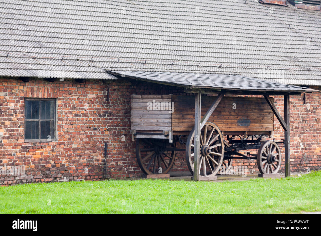 Old cart outside building at Auschwitz-Birkenau concentration camp ...