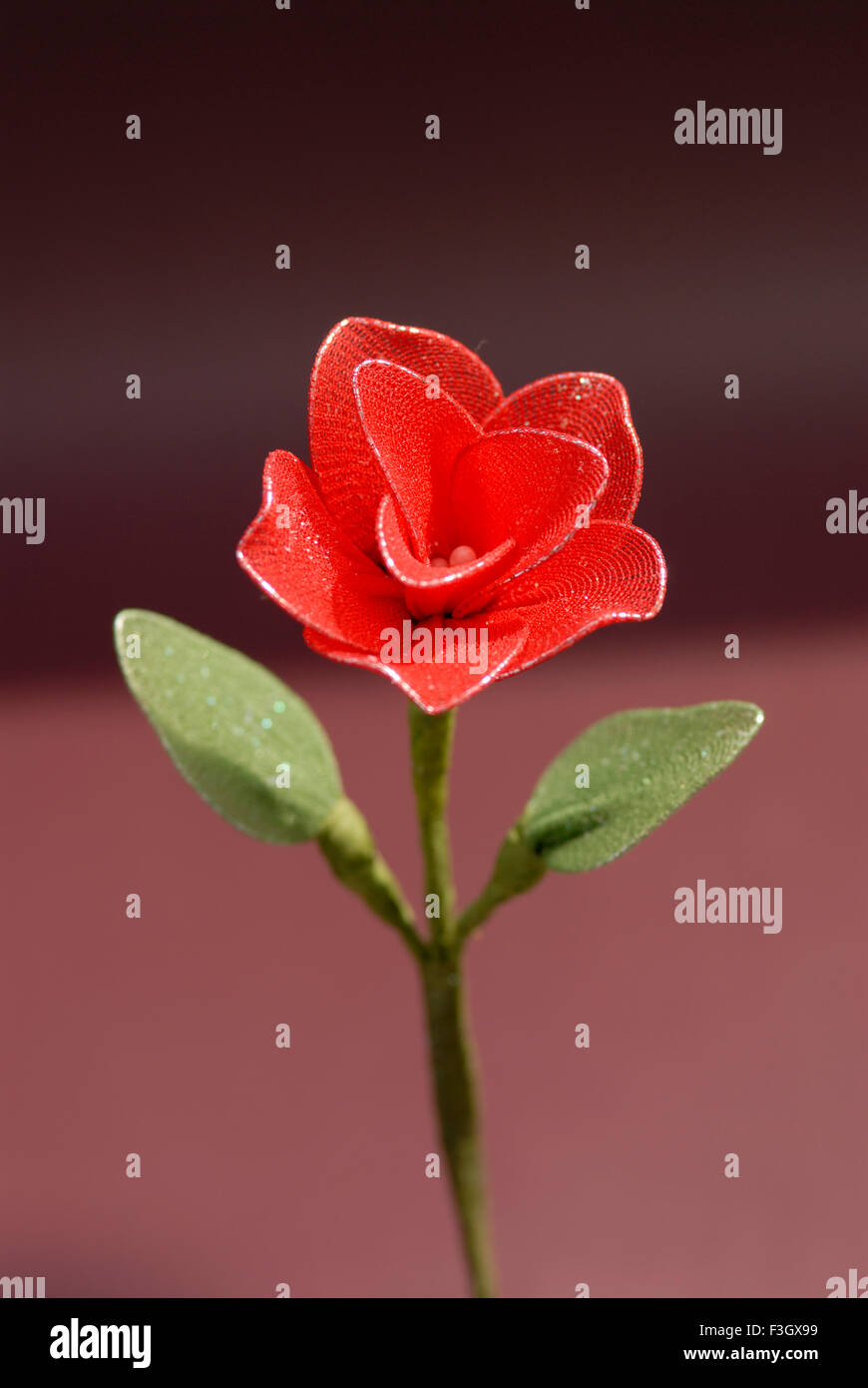 Red flower made in net cloth Stock Photo - Alamy