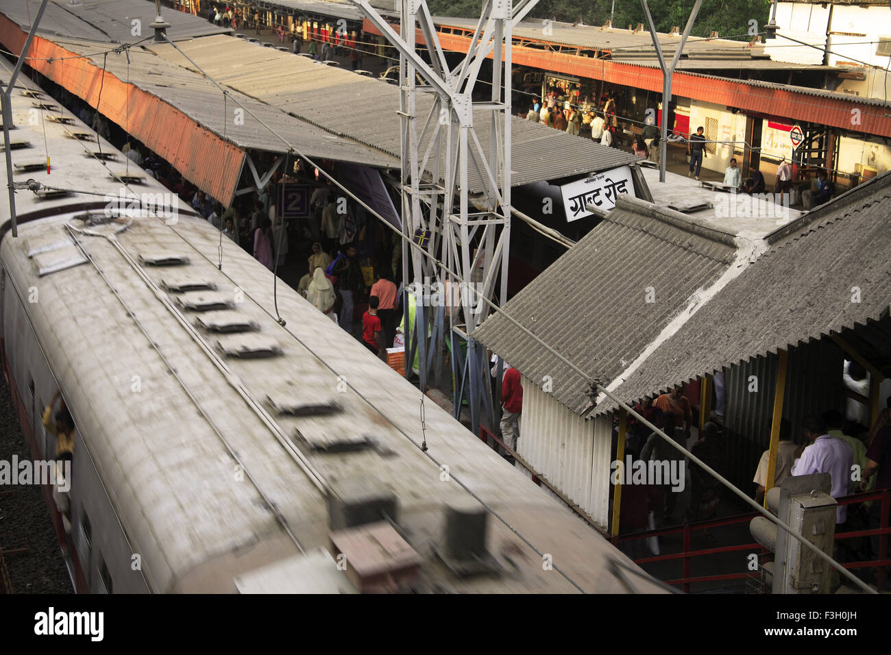 Suburban western railway local train station ; Grant road ; Bombay now ...