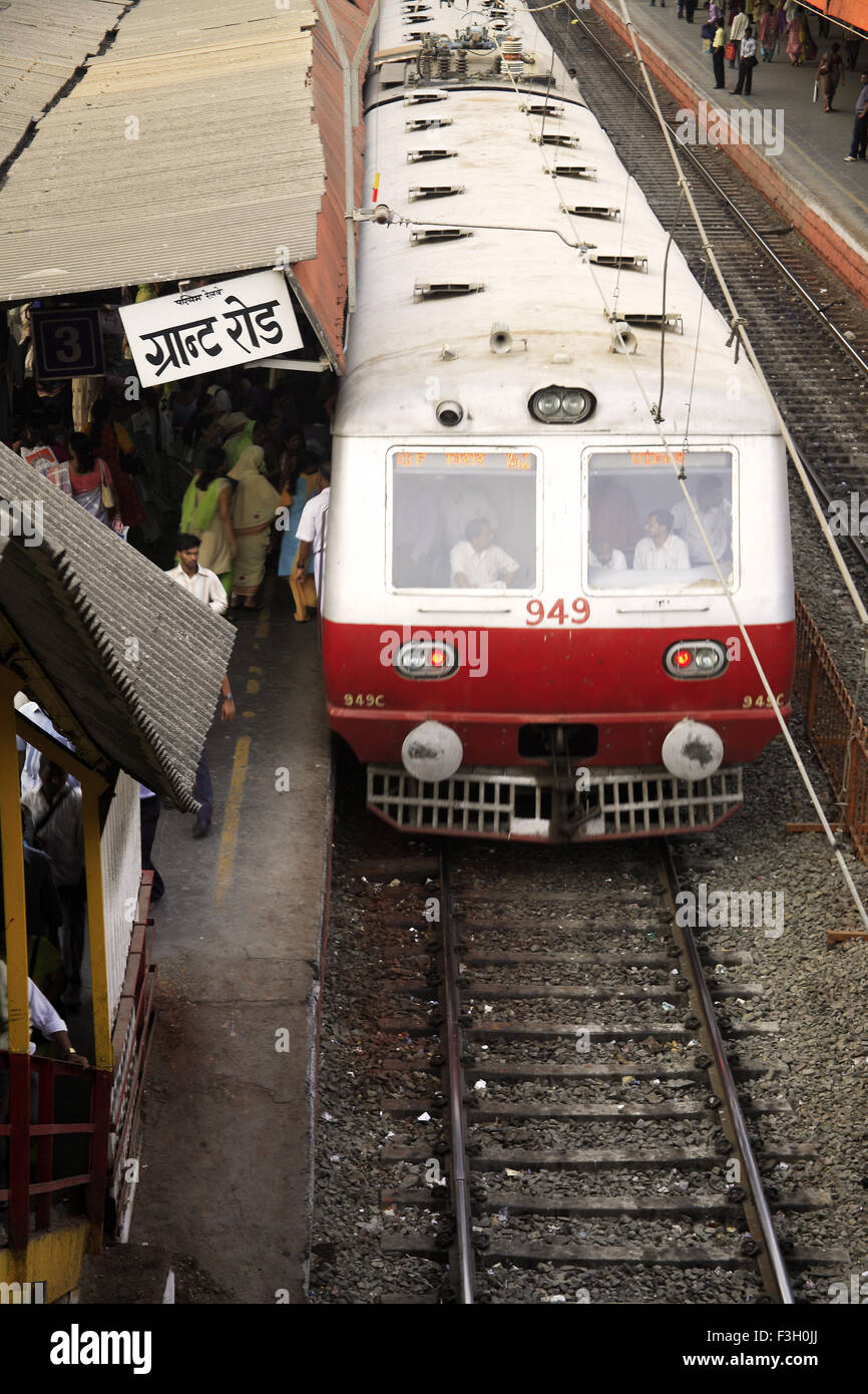 Suburban western railway local train station ; Grant road ; Bombay now ...