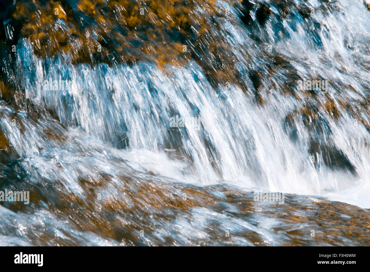 Arabian sea water flowing on rock waterfall ; Aksa Beach ; Malad ...