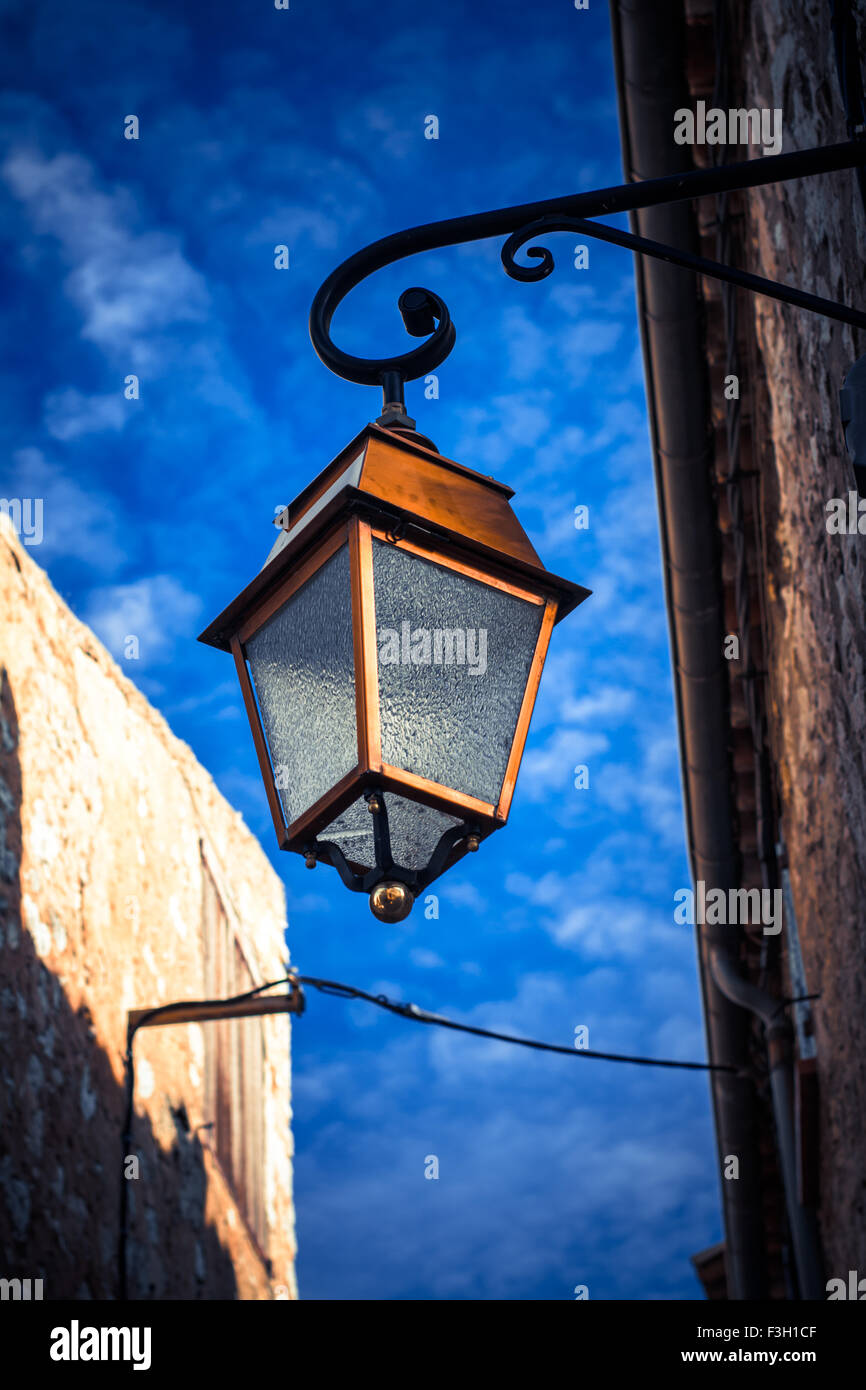 Old lamp in outdoor in a village in southern France Stock Photo - Alamy