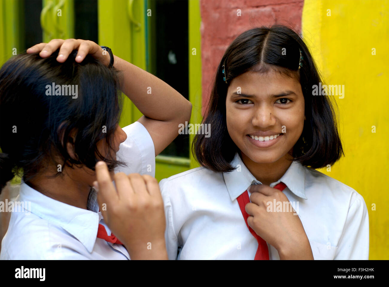 two girls ; school student ; Nanhi Dunya school ; Doon School ...