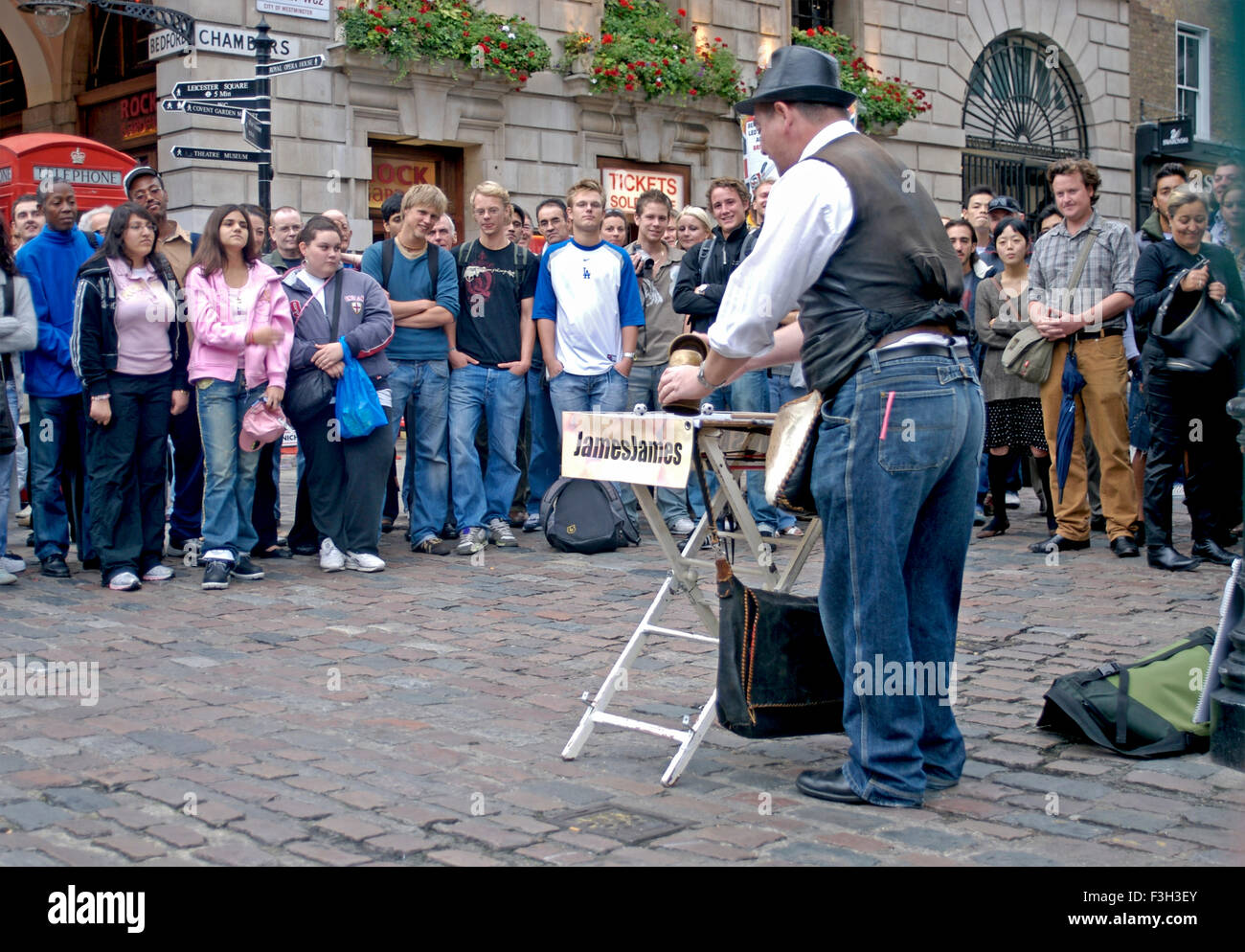 Boys and girls watching street performance by James at Convent Garden ...