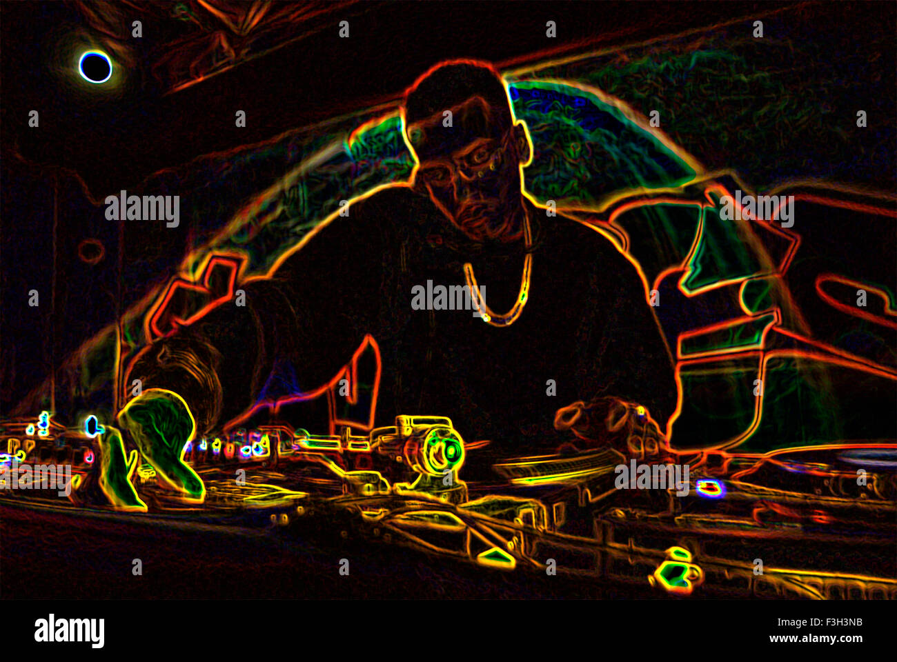 Disc jockey DJ scratching LP using turntable at night club Stock Photo ...