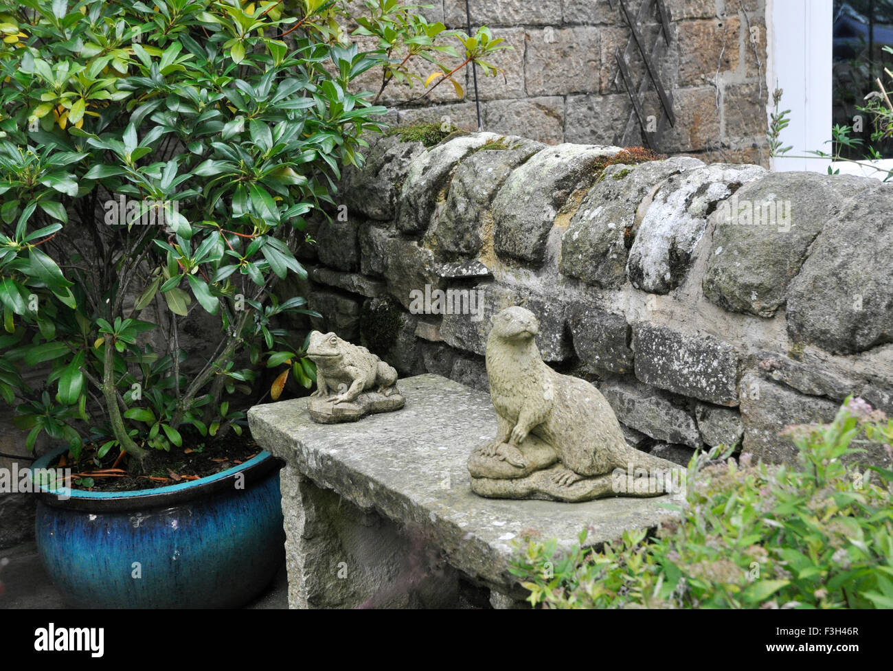 stone animals in front garden Stock Photo - Alamy