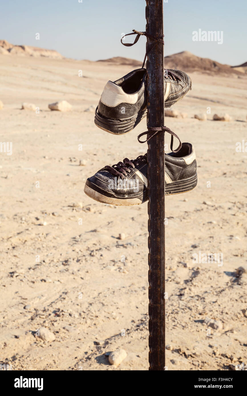 sports shoes on the background of desert Stock Photo - Alamy