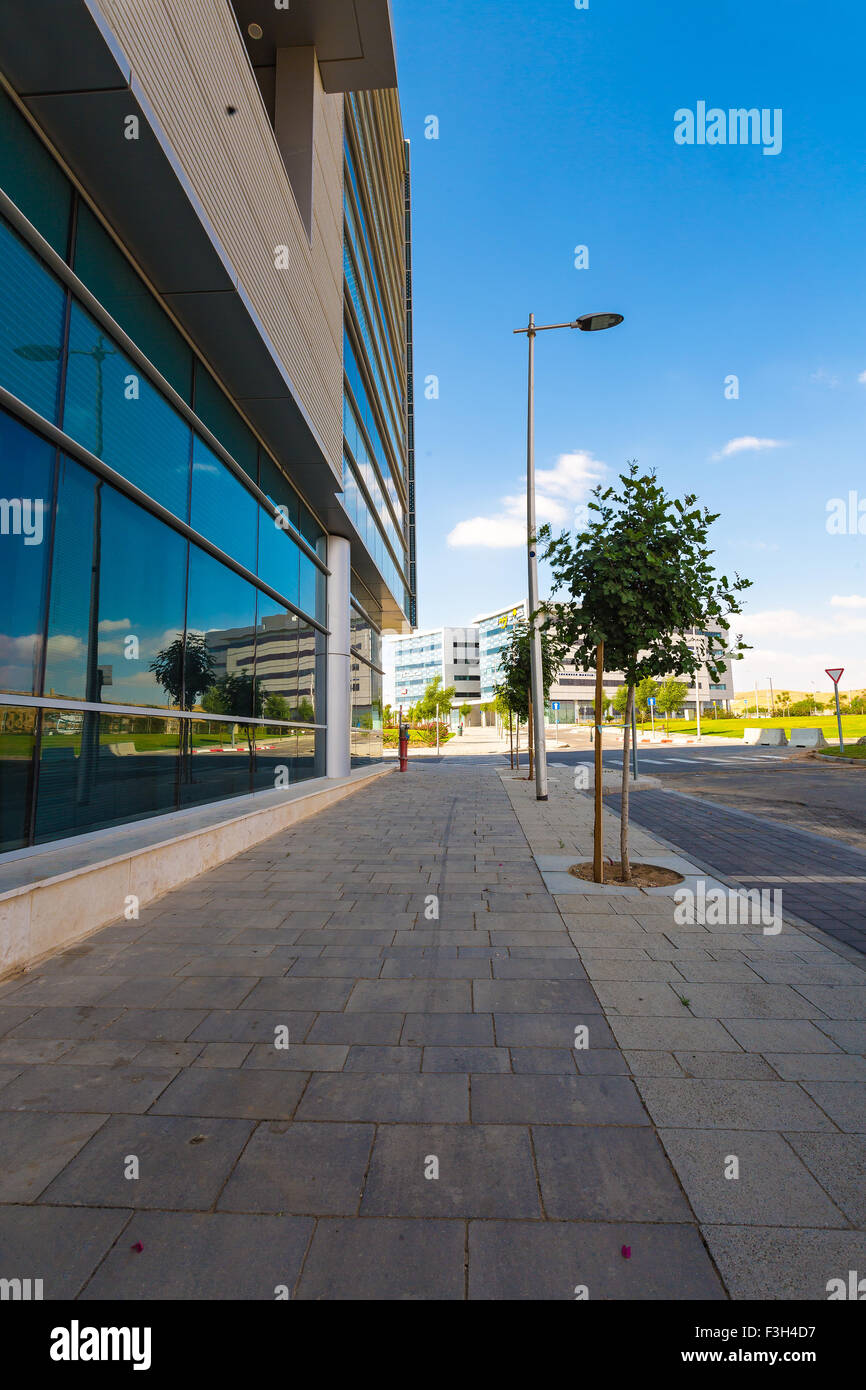 an empty city street with modern buildings Stock Photo - Alamy
