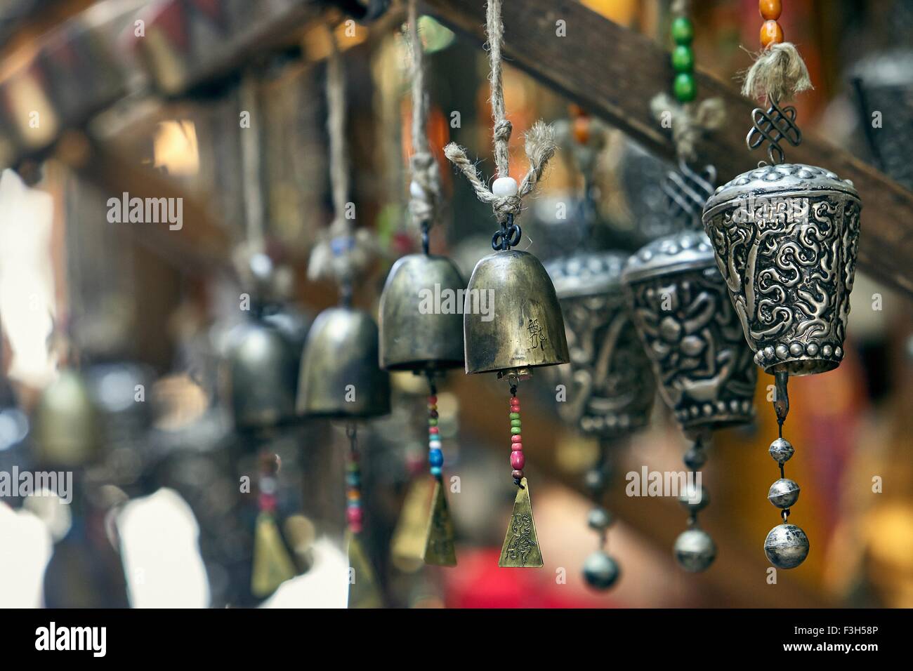Close up of traditional Chinese wind chimes, Lijiang, Yunnan, China ...
