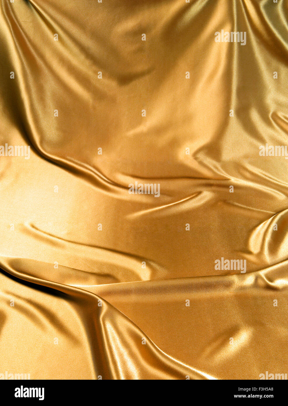 Gold satin backdrop hi-res stock photography and images - Alamy