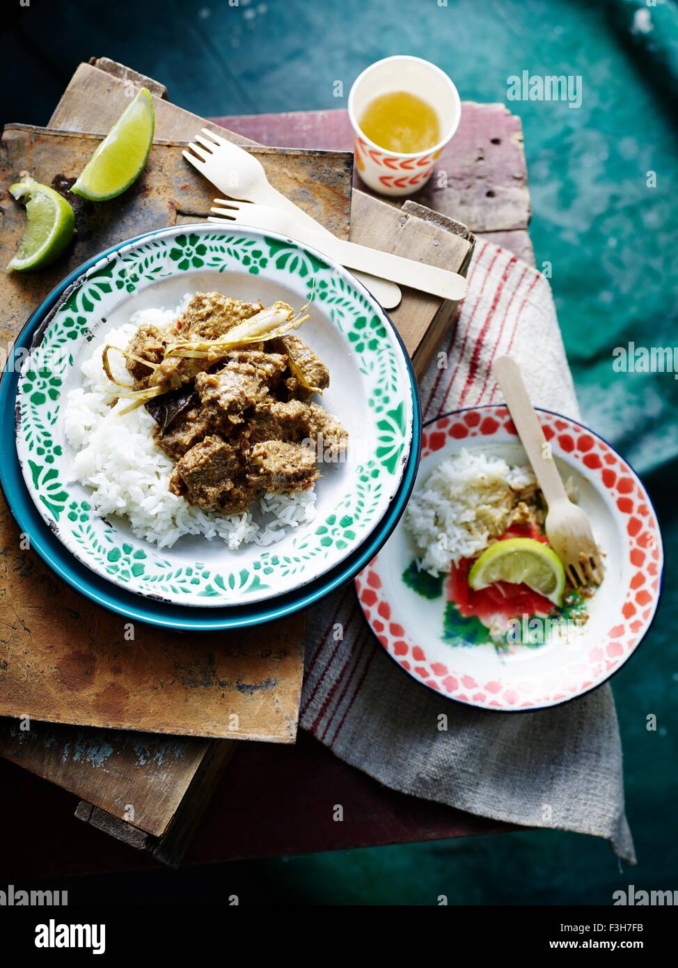 Overhead view of Malaysian Beef Rendang on enamel plate Stock Photo - Alamy
