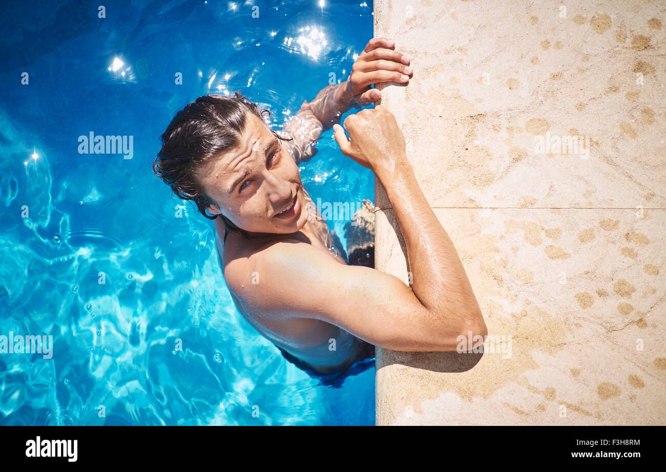Good looking man in swimming pool hi-res stock photography and images ...