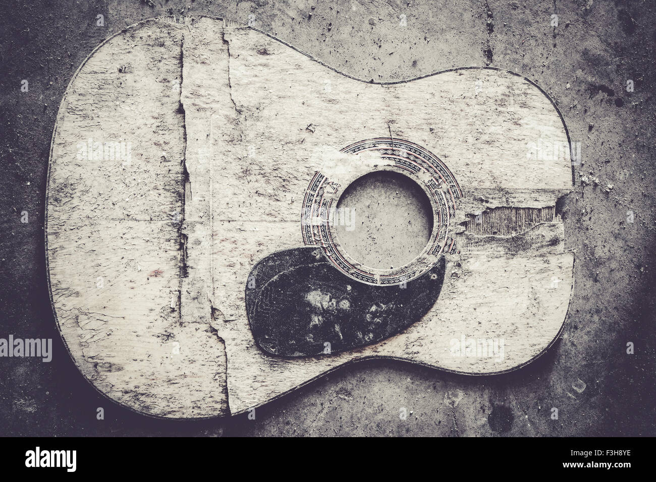 Broken acoustic guitar Stock Photo - Alamy