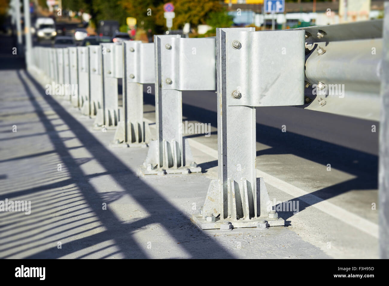 Anodized safety steel barrier on freeway bridge Stock Photo - Alamy