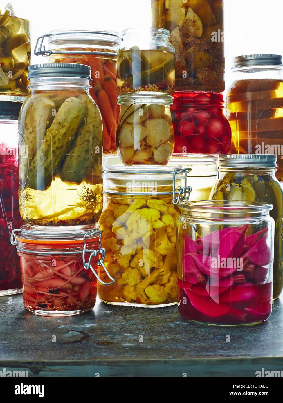 Various pickles in glass jars, close-up Stock Photo - Alamy