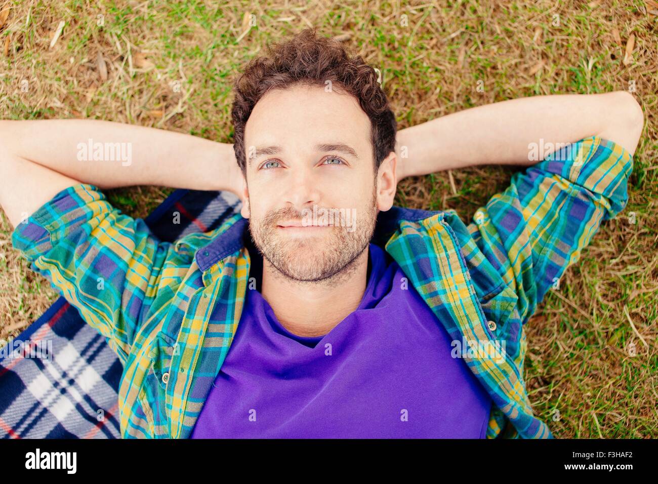 See his hands on the back of the head hi-res stock photography and ...