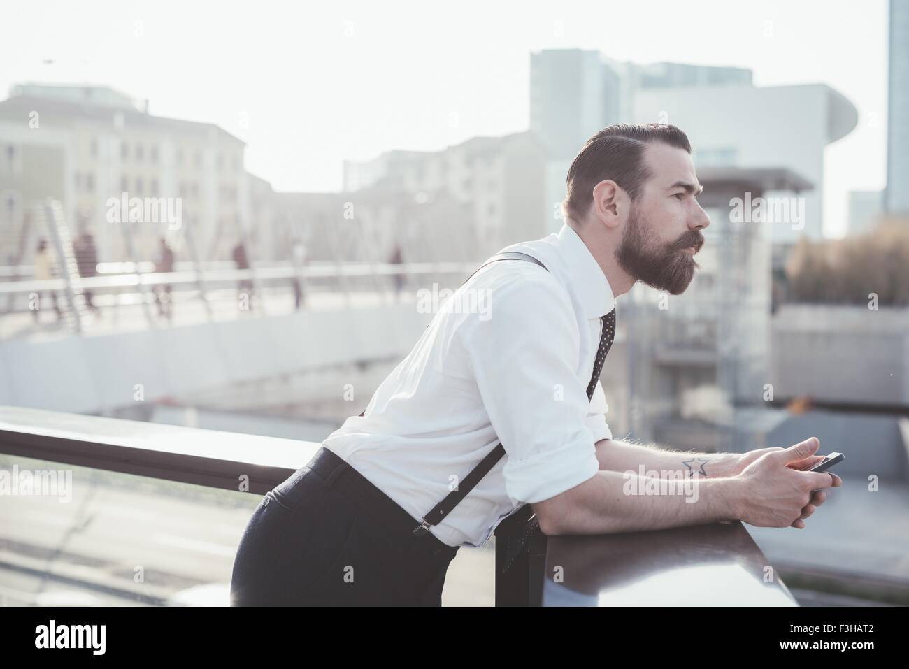 Leaning out of balcony hi-res stock photography and images - Alamy