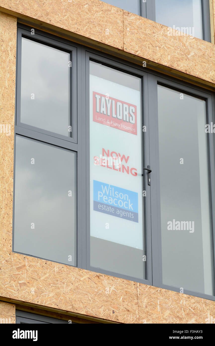 Flats now selling sign - by Taylors and Wilson Peacock Estate Agents in ...