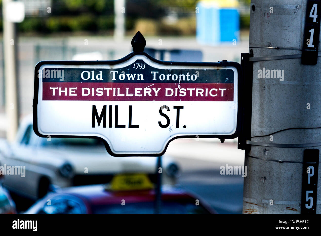 Street sign for the Distillery District in Downtown Toronto. Mill St ...