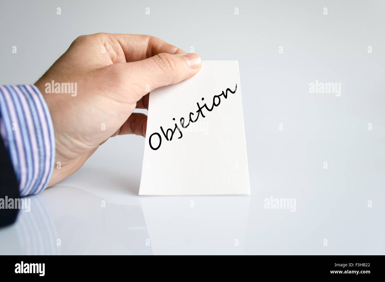 Objection text concept isolated over white background Stock Photo - Alamy