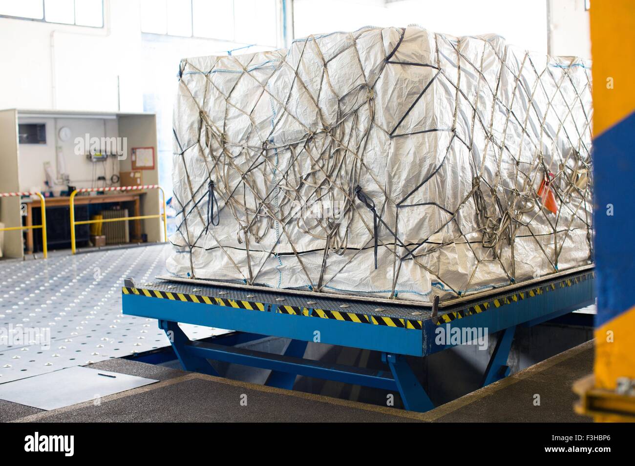 Air freight on lifting machine in air freight warehouse Stock Photo - Alamy
