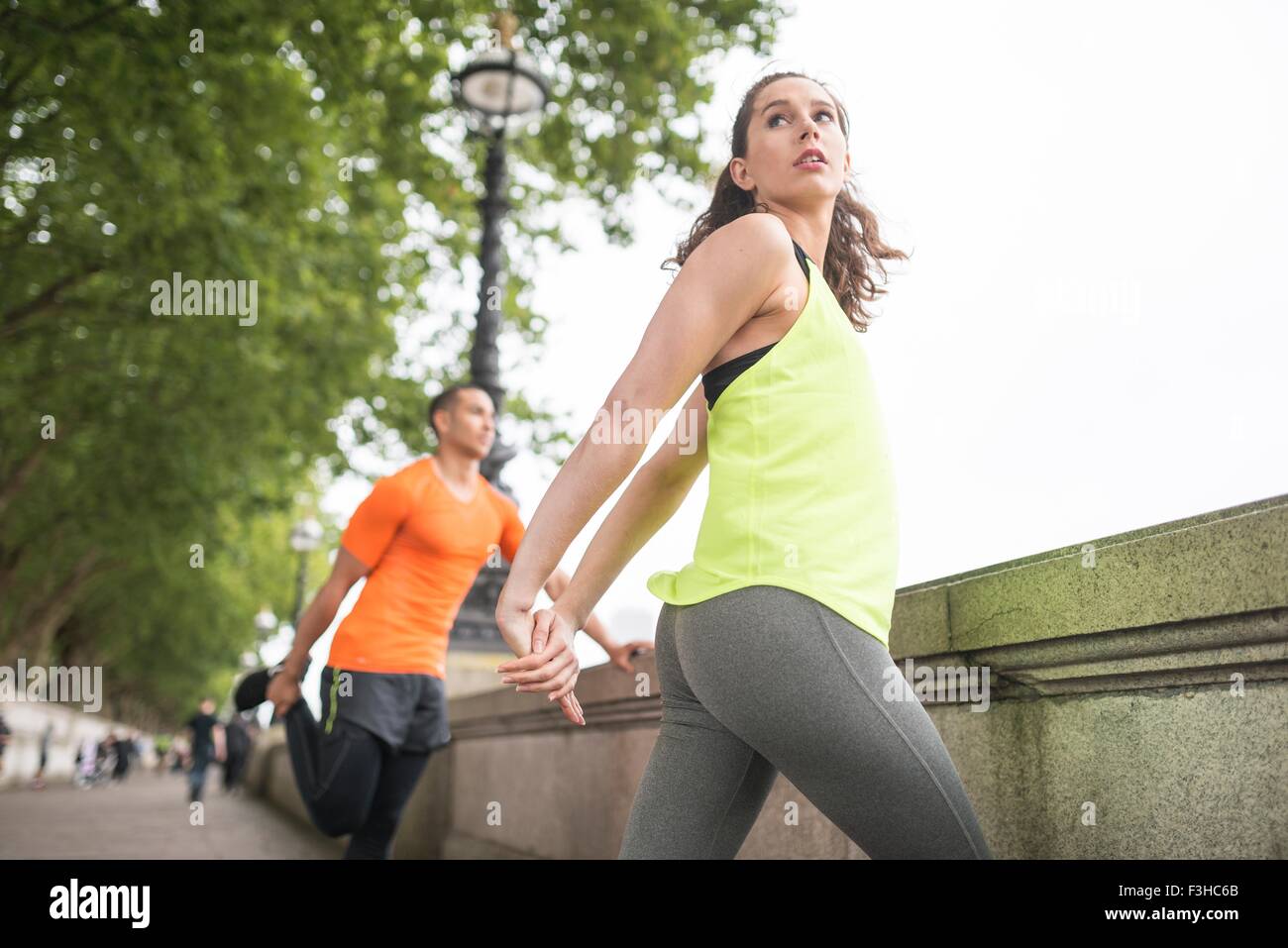 Young man running at riverside hi-res stock photography and images - Alamy