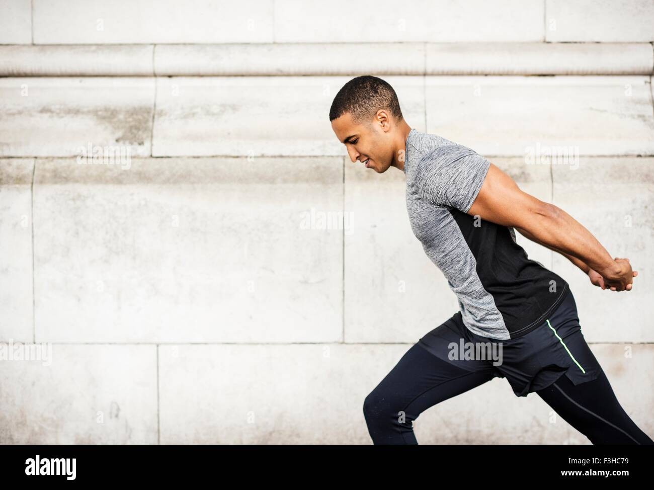 Man hands behind back side view hi-res stock photography and images - Alamy