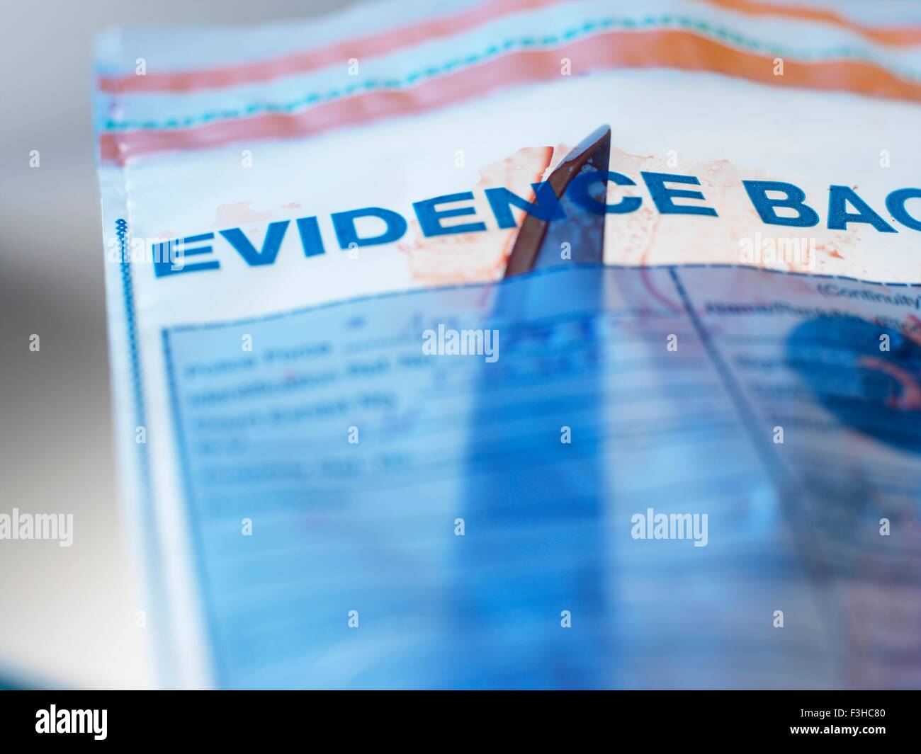 Evidence from knife crime incident in forensic bag Stock Photo - Alamy