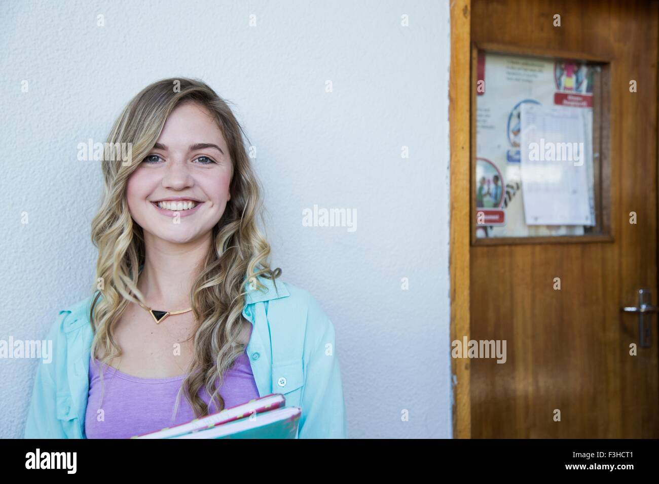 Student outside classroom Stock Photo - Alamy