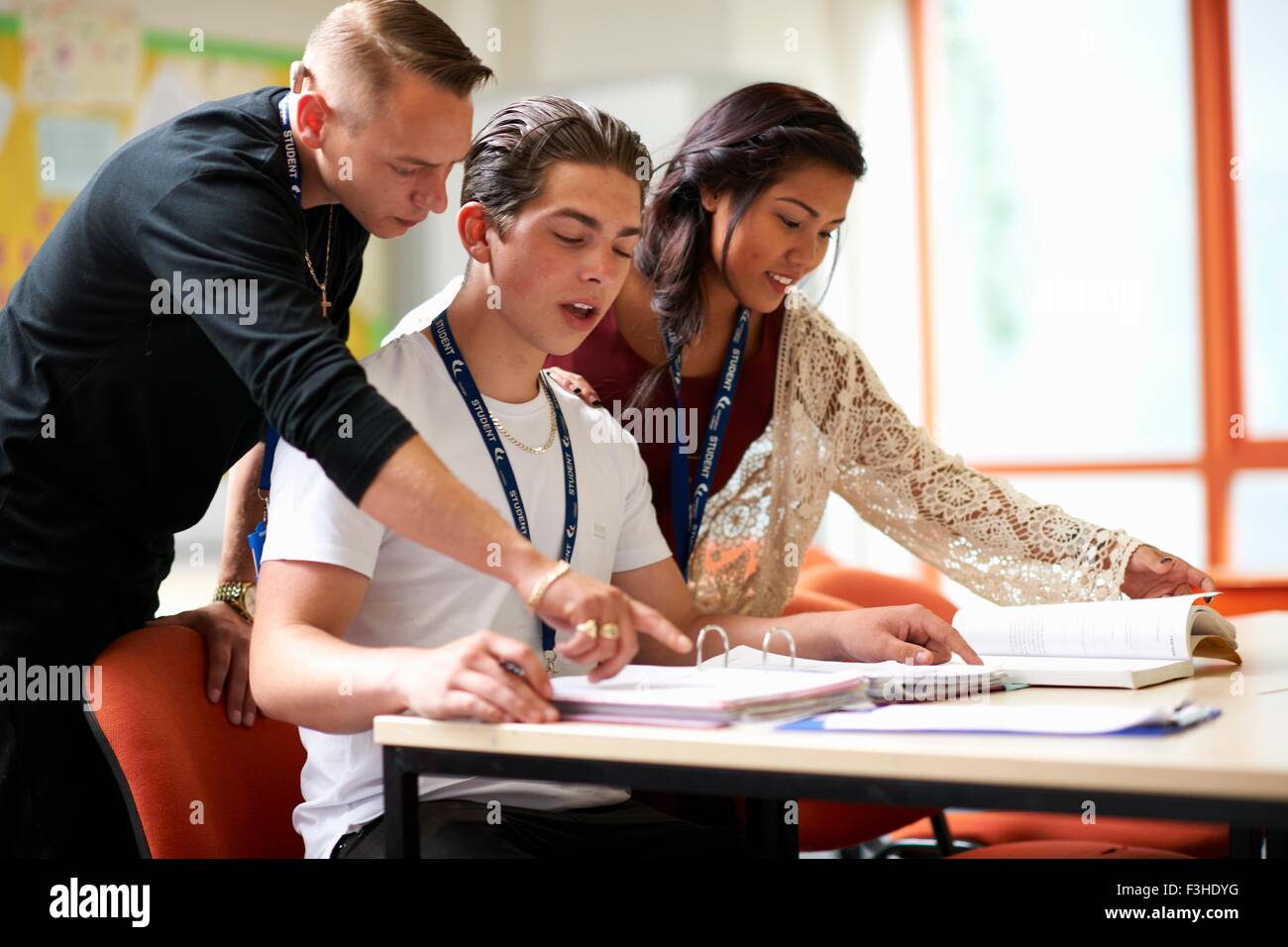 Students writing in classroom hi-res stock photography and images - Alamy
