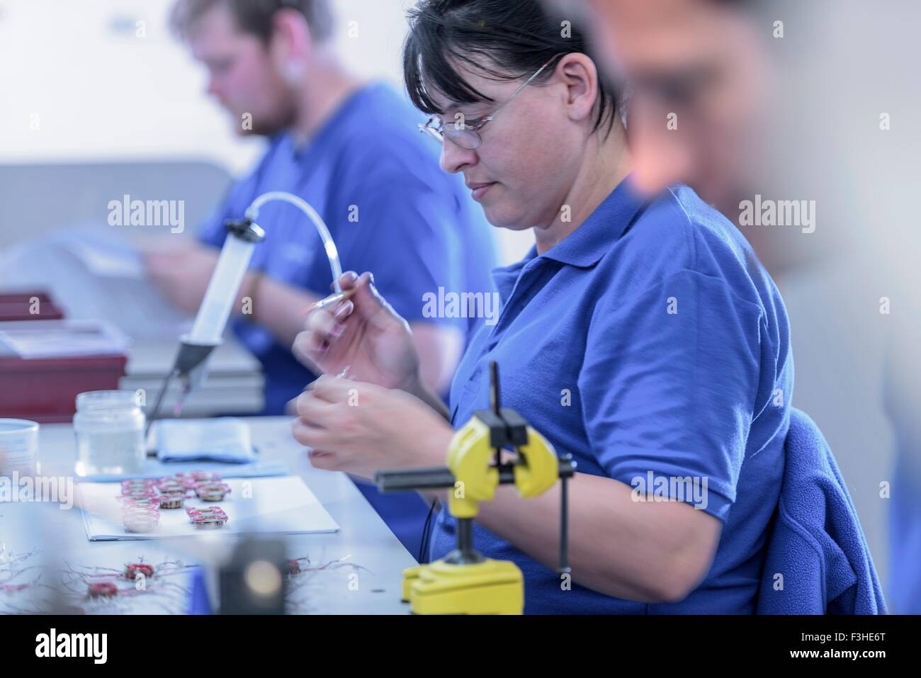 Female line worker hi-res stock photography and images - Alamy